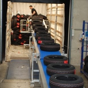 Container Unloading Conveyor - Tyres & Parcels - Materials Handling